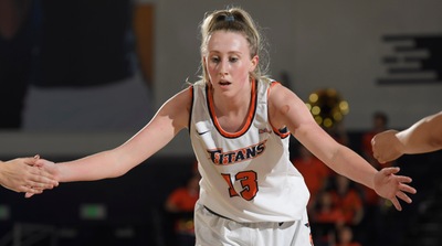 Amiee Book double-double helps Titans advance behind closed doors ...